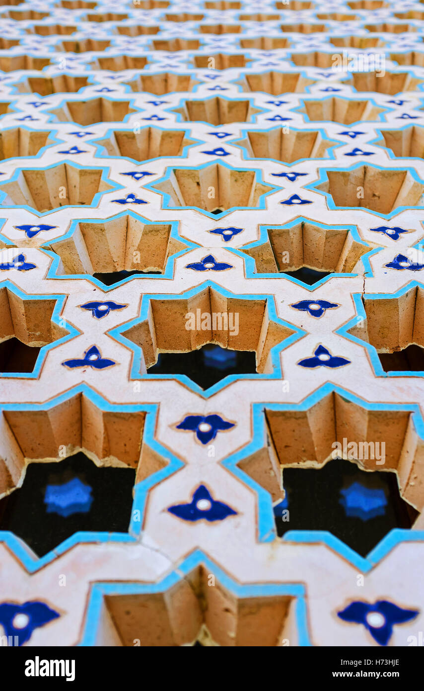 The small carved octagonal stars (the classic Islamic pattern) decorate ...