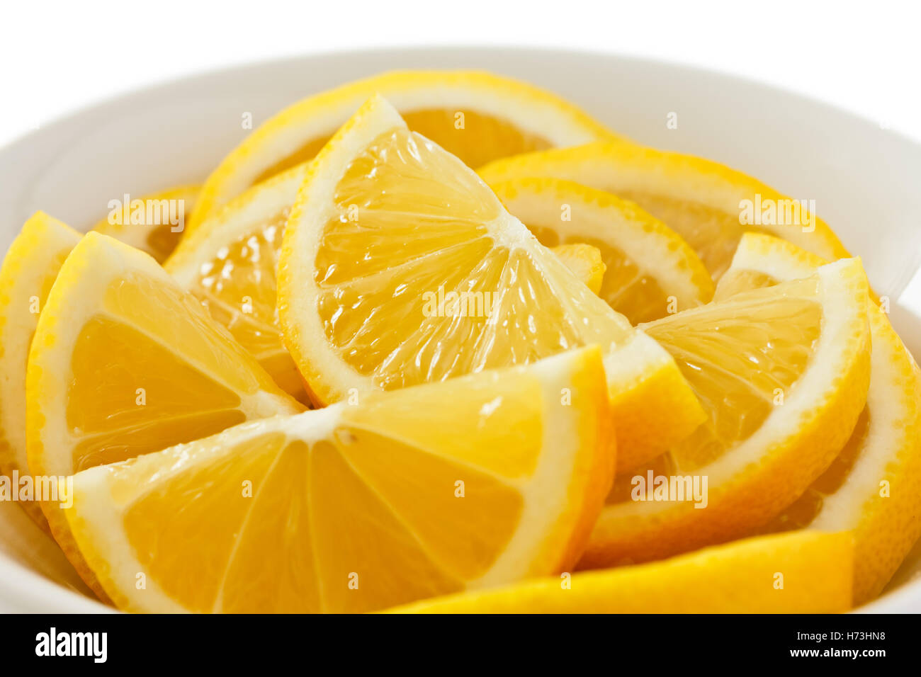 Bowl of lemon slices Stock Photo - Alamy