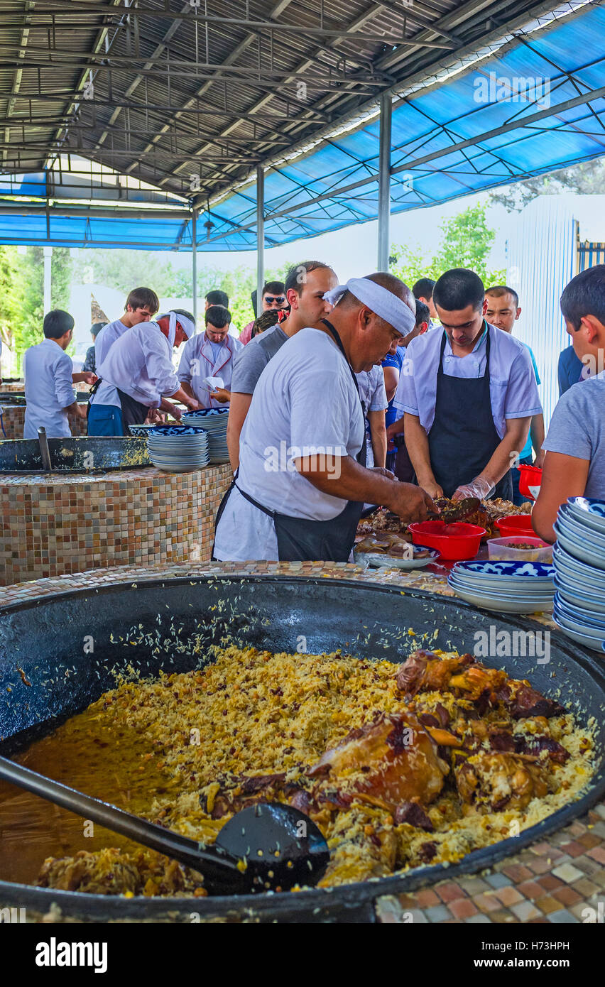 The pilaf is Uzbek national dish, process of cooking is popular ...