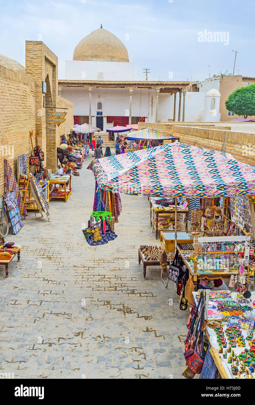The tourist market on the narrow street, next to the East Gates is the ...