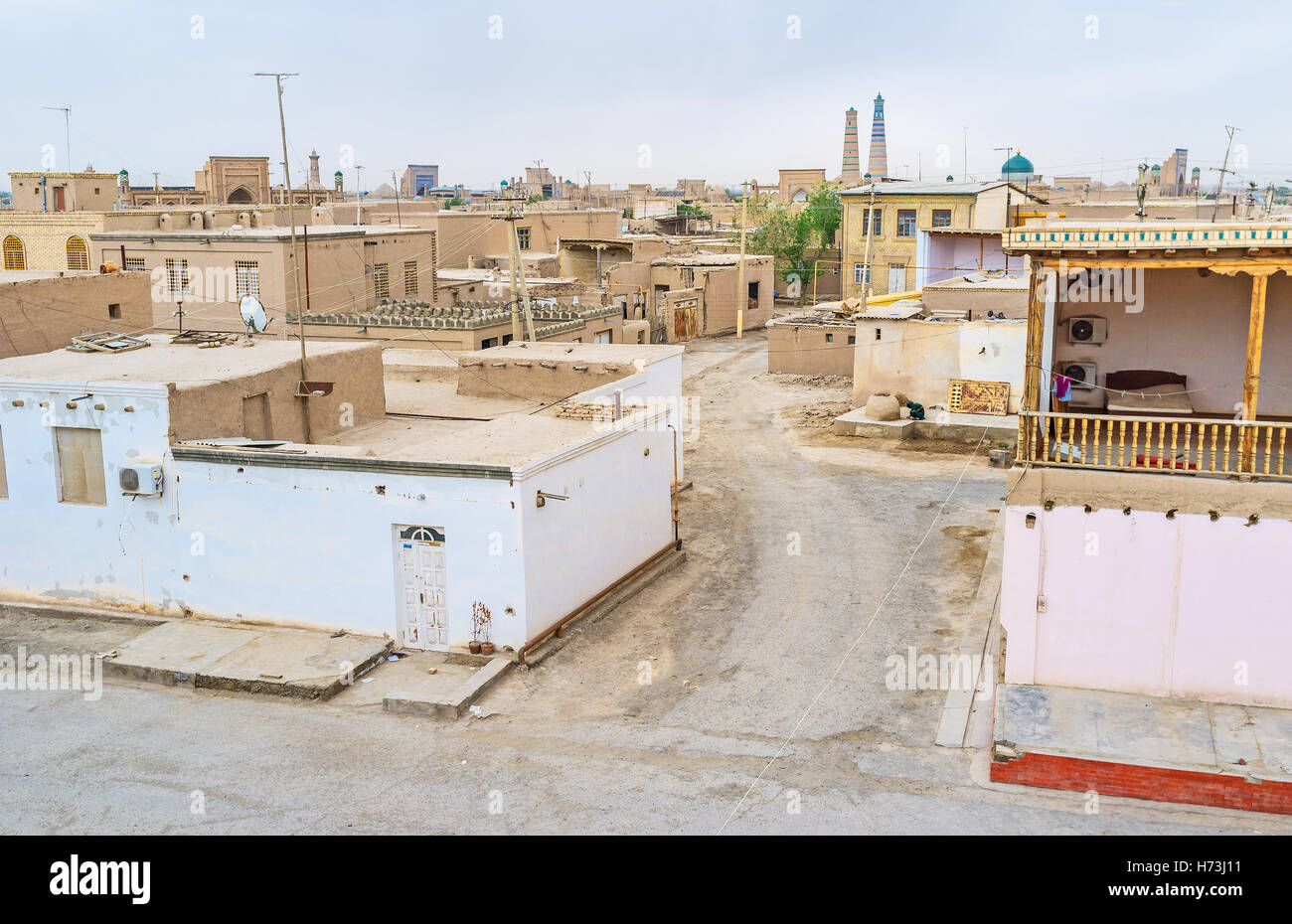 The old Uzbek town with clay and brick houses, surrounded by the ...