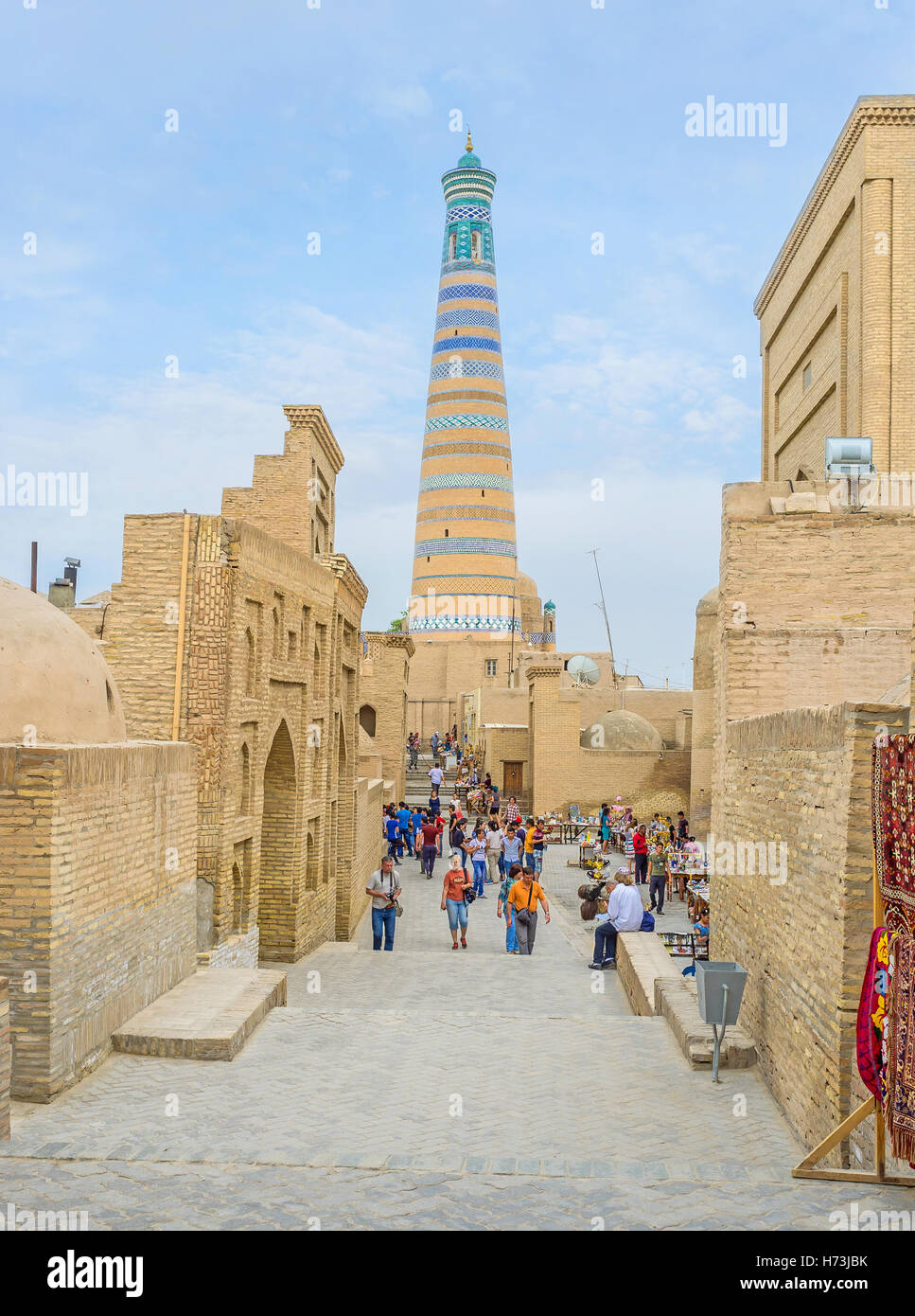 The narrow street with the old brick buildings leads to the Islam Khoja ...