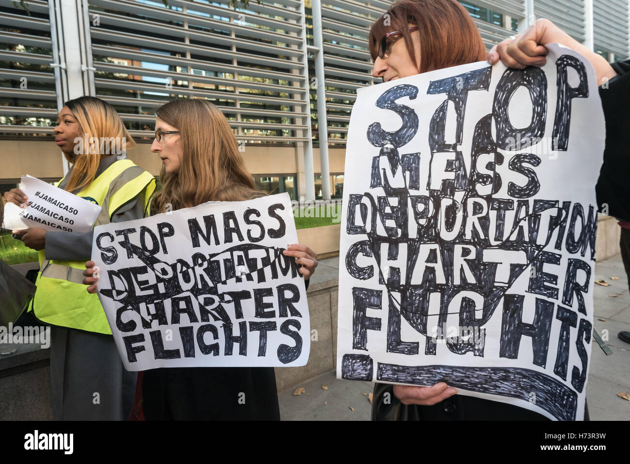 London, UK. 2nd November 2016. Campaigners hold posters agains mass ...