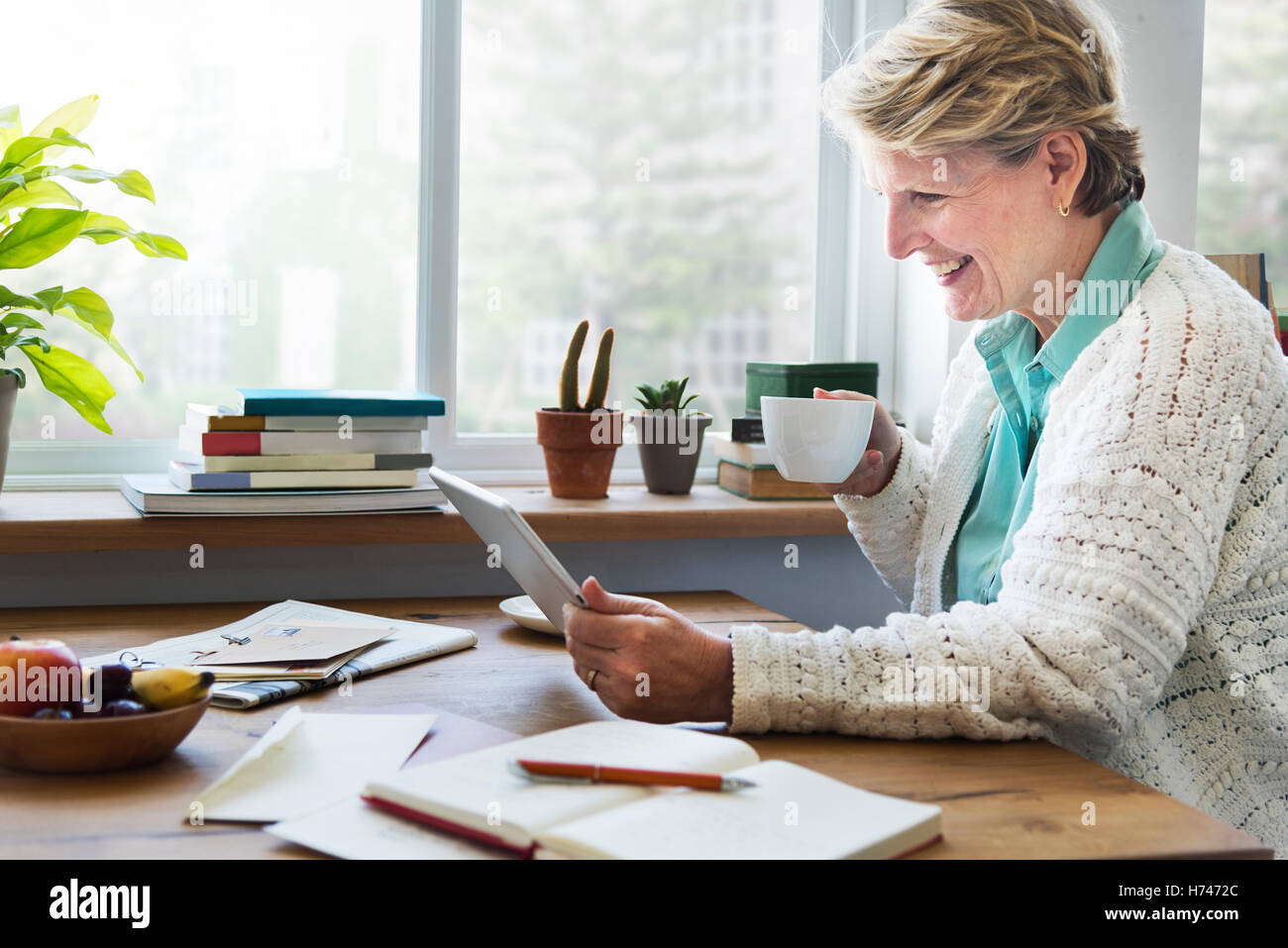 Senior Adult Using Digital Device Tablet Concept Stock Photo - Alamy