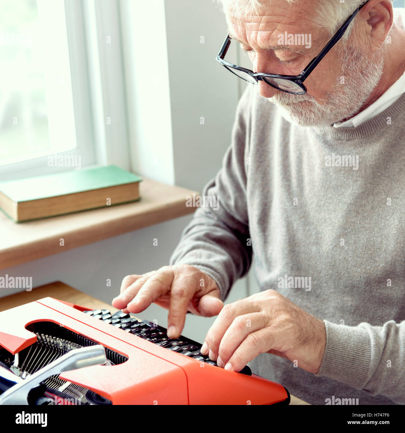 Senior Adult Typing Typerwriter Concept Stock Photo - Alamy