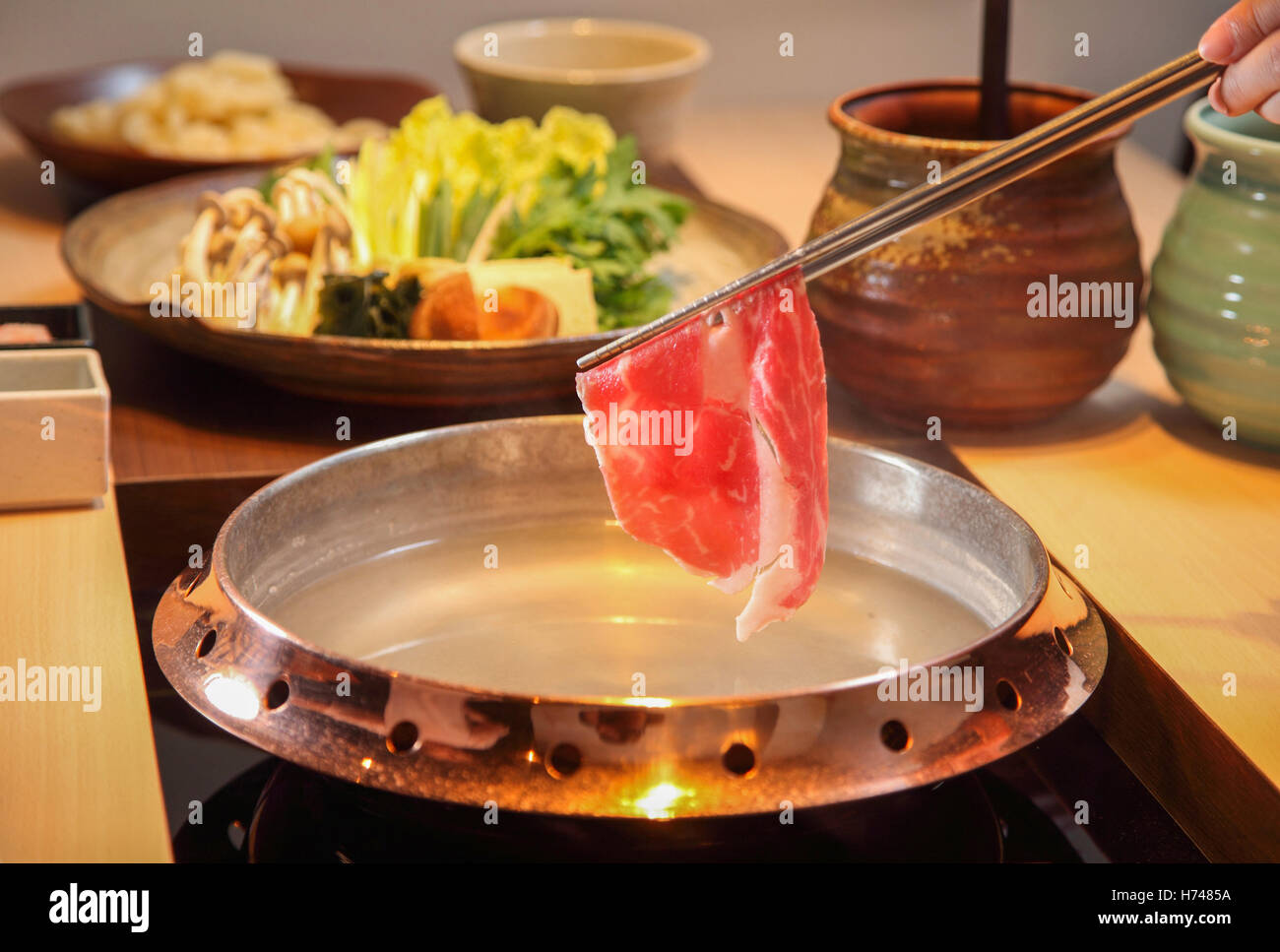 Meat boiling in pot hi-res stock photography and images - Alamy