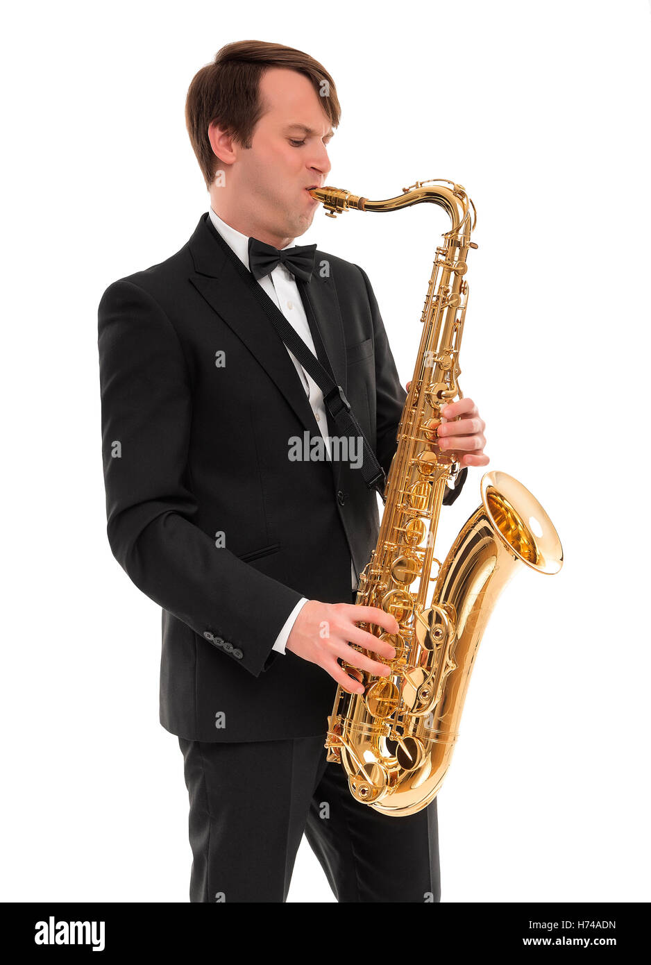 Saxophonist plays music musician blowing hi-res stock photography and ...