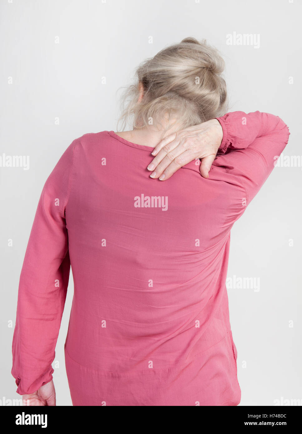 elderly woman with back pain Stock Photo - Alamy
