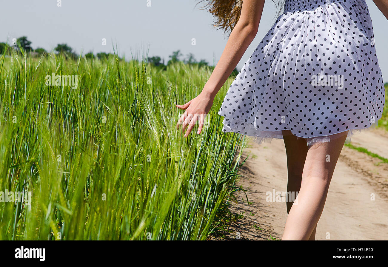 Young girl hand touching plant hi-res stock photography and images - Alamy