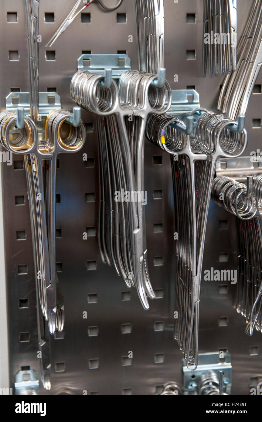 Surgical tools organized on a rack, waiting to be sterilised for ...