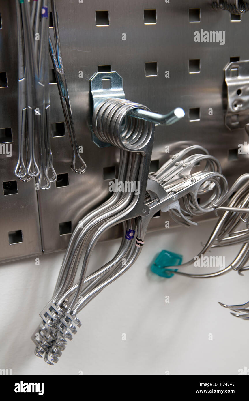 Surgical tools organized on a rack, waiting to be sterilised for ...