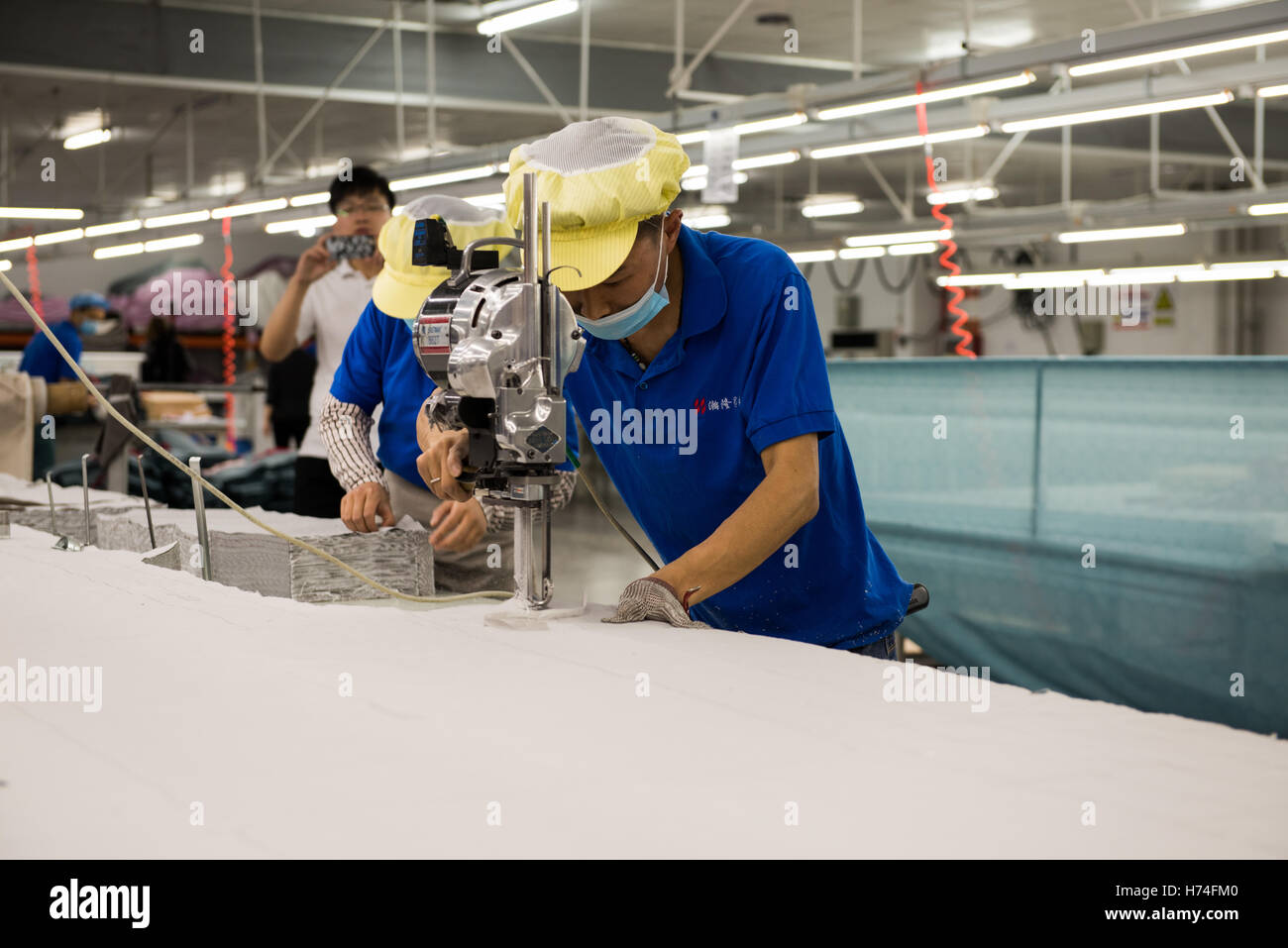 Fabric handling hi-res stock photography and images - Alamy