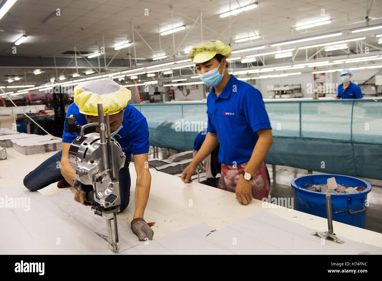 Textile industry fabric cutting hi-res stock photography and images - Alamy