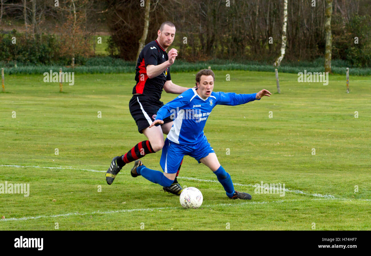 Footballers tackle hi-res stock photography and images - Alamy