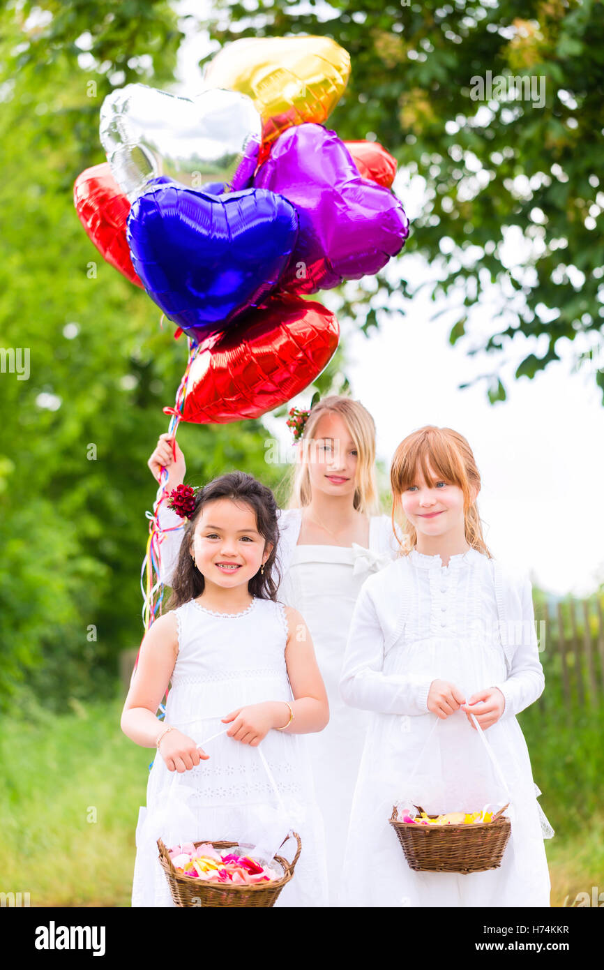 wedding flower children with petals basket Stock Photo - Alamy