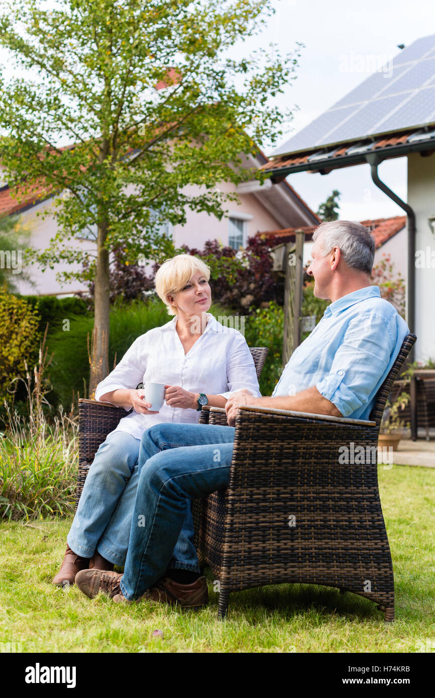 Person sit before an old house hi-res stock photography and images - Alamy