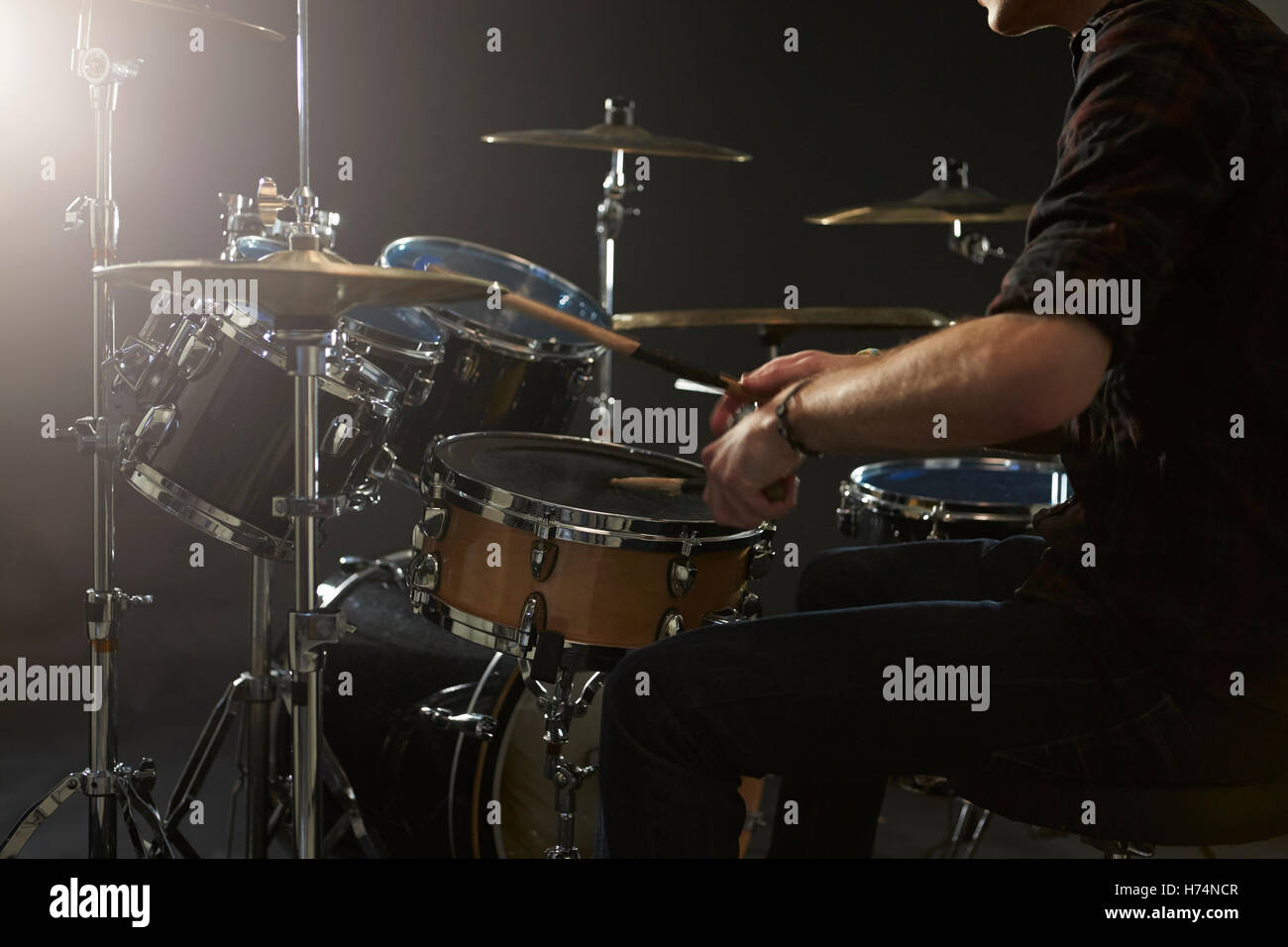 Close Up Of Drummer Playing Drum Kit In Studio Stock Photo - Alamy