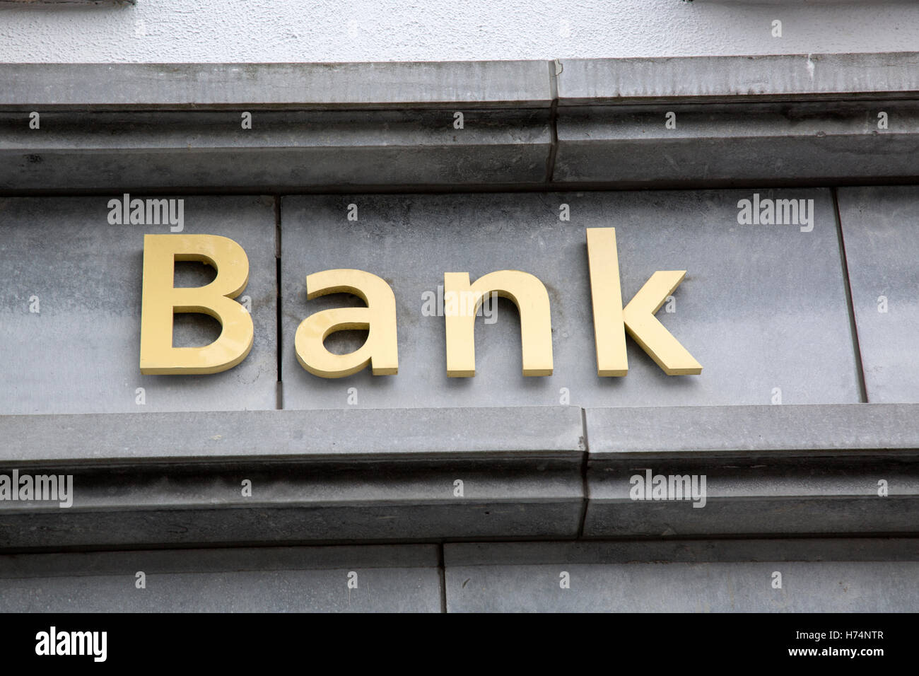 Gold Bank Sign on Building Facade Stock Photo - Alamy