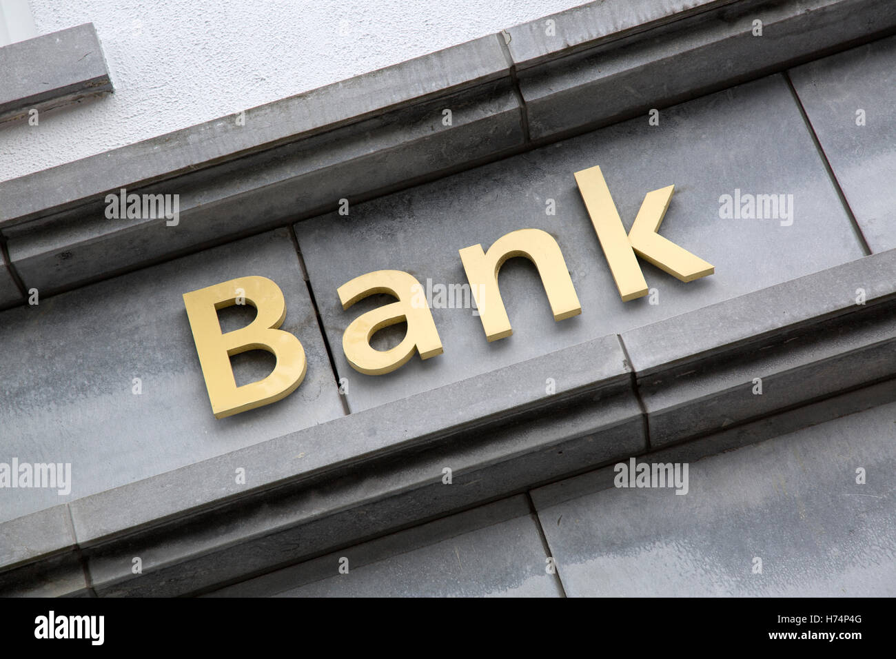 Gold Bank Sign on Building Facade Stock Photo - Alamy