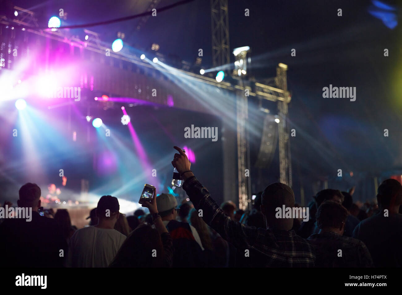 Rear View Of Audience Enjoying Music Festival Stock Photo - Alamy