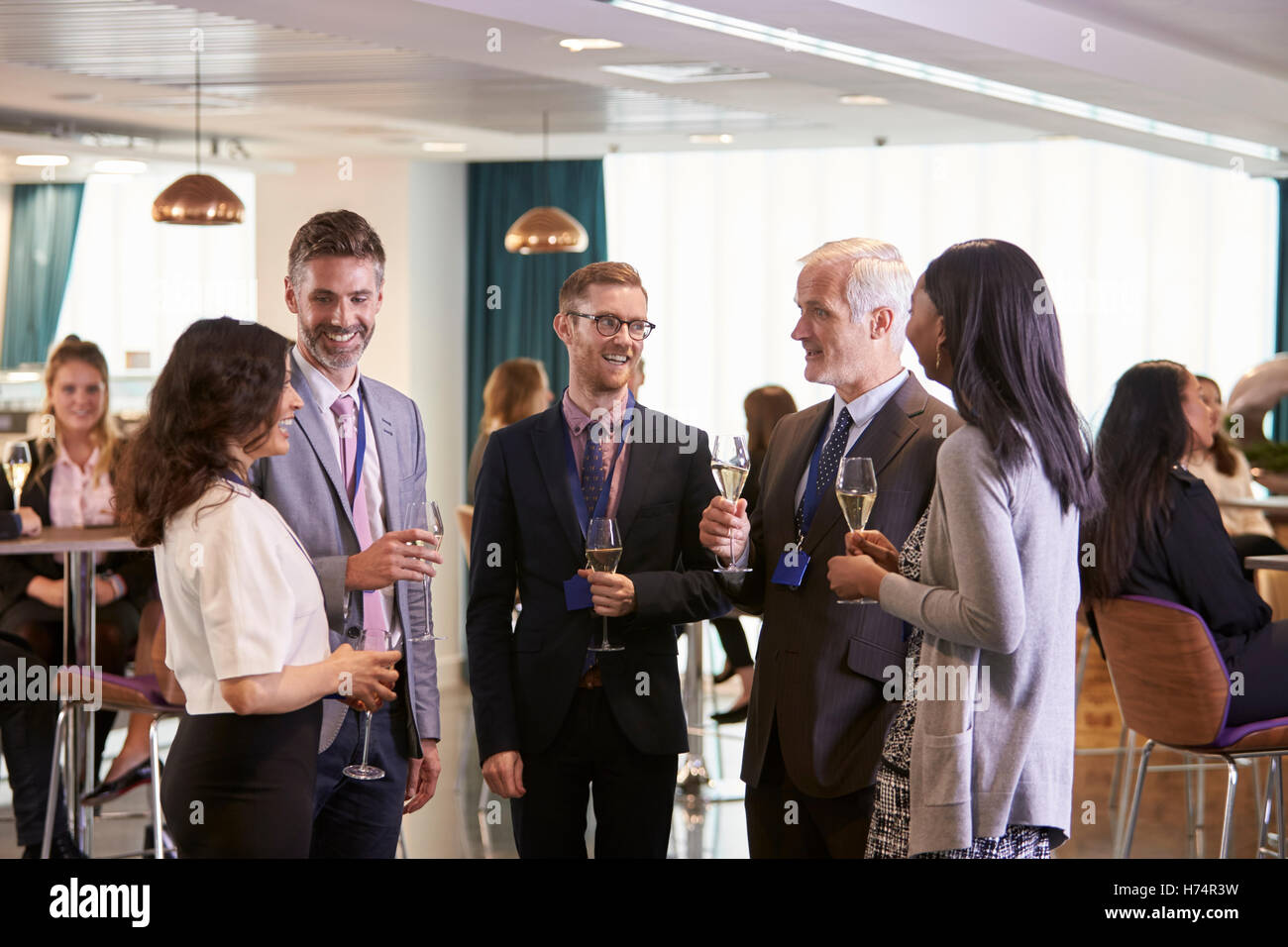 Delegates Networking At Conference Drinks Reception Stock Photo - Alamy