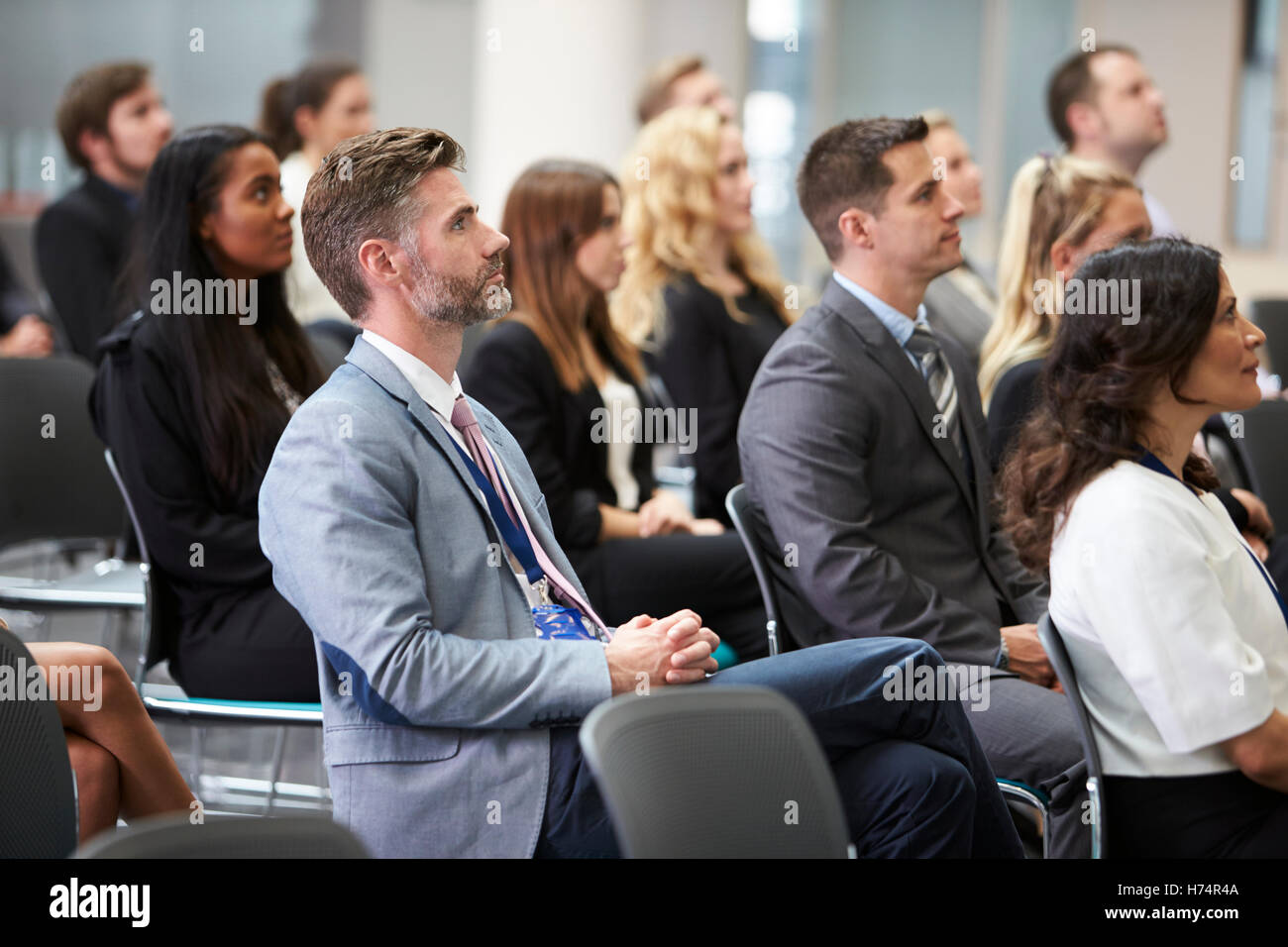Audience Listening To Speaker At Conference Presentation Stock Photo ...