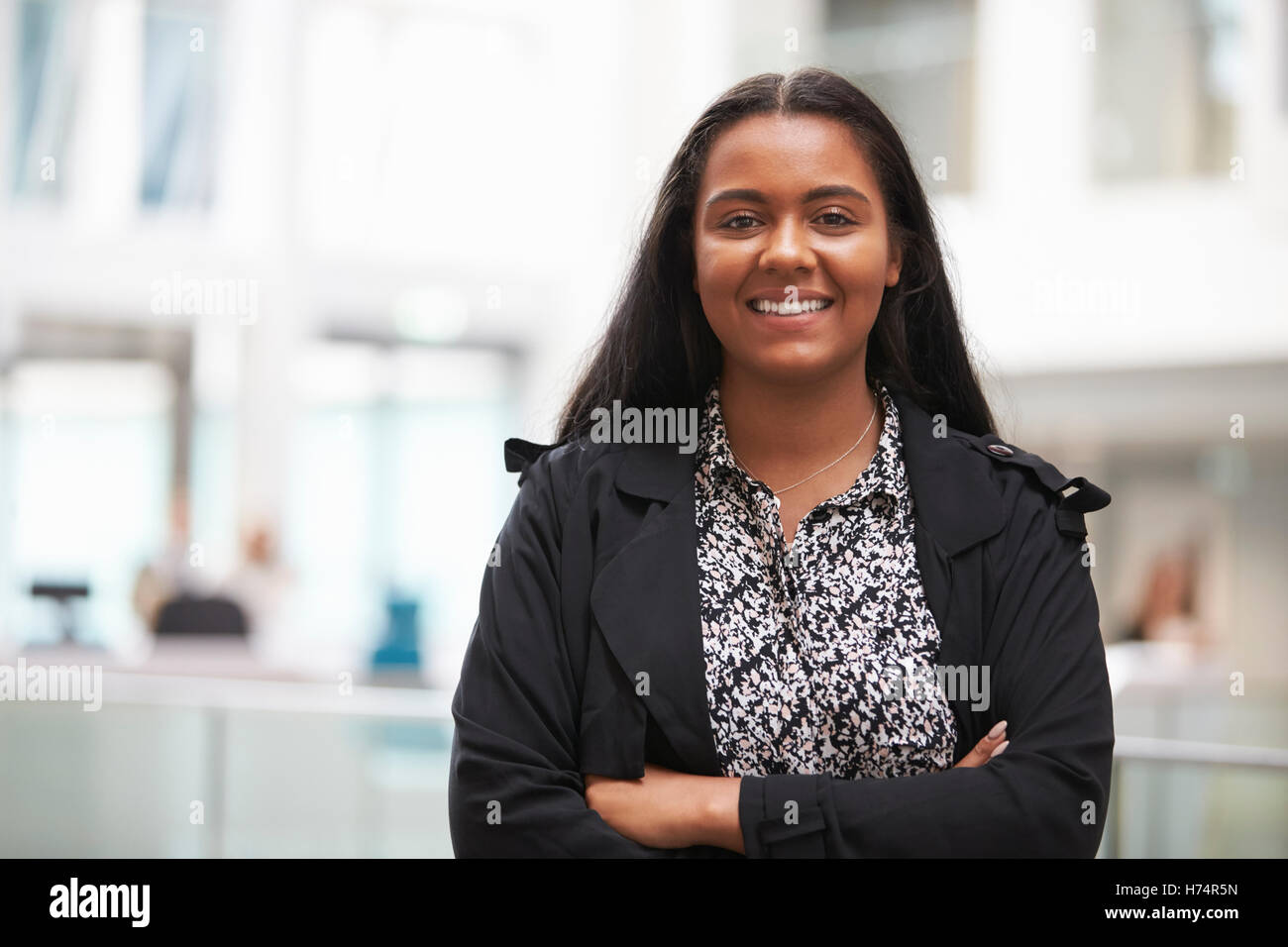 Head And Shoulders Portrait Of Young Businesswoman In Office Stock ...
