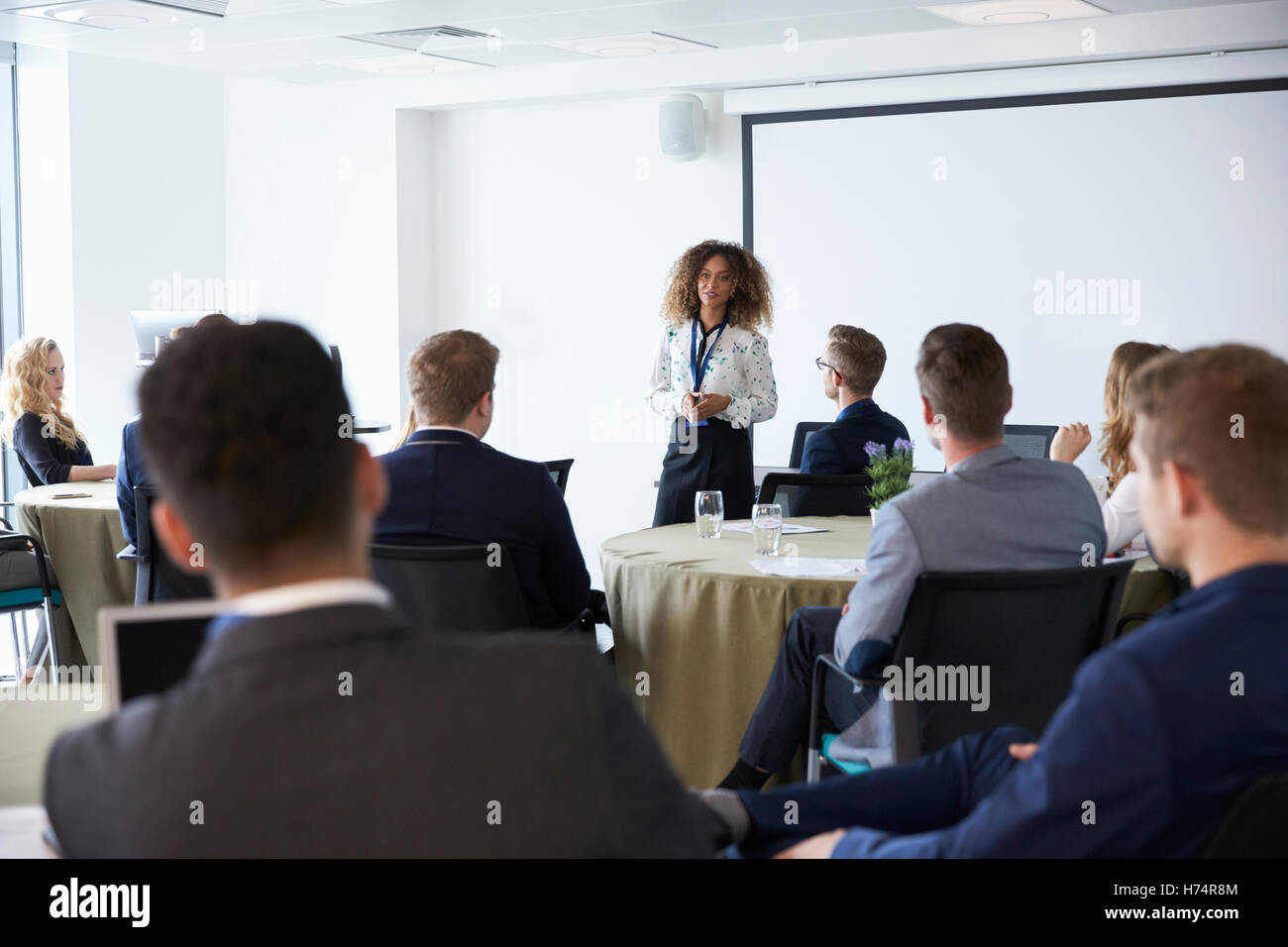 Black speaker making presentation conference hi-res stock photography ...