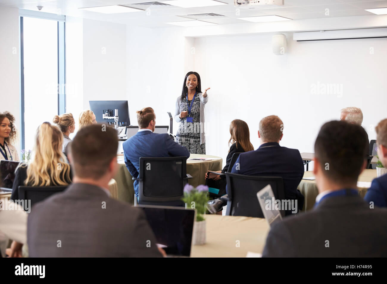 Black speaker making presentation conference hi-res stock photography ...