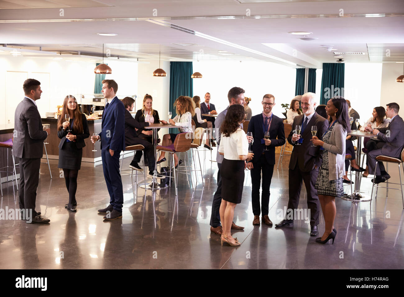 Delegates Networking At Conference Drinks Reception Stock Photo - Alamy