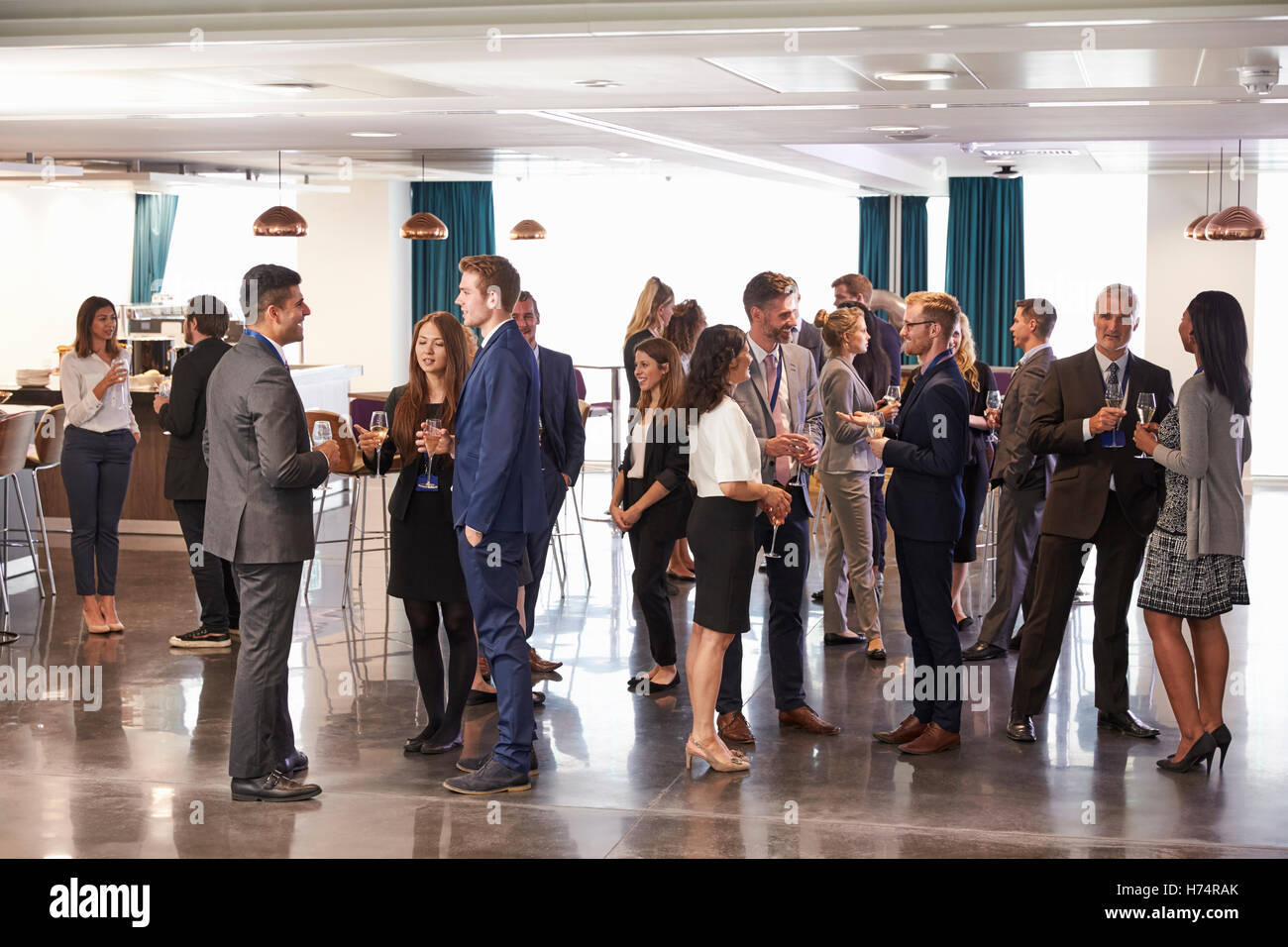 Delegates Networking At Conference Drinks Reception Stock Photo - Alamy