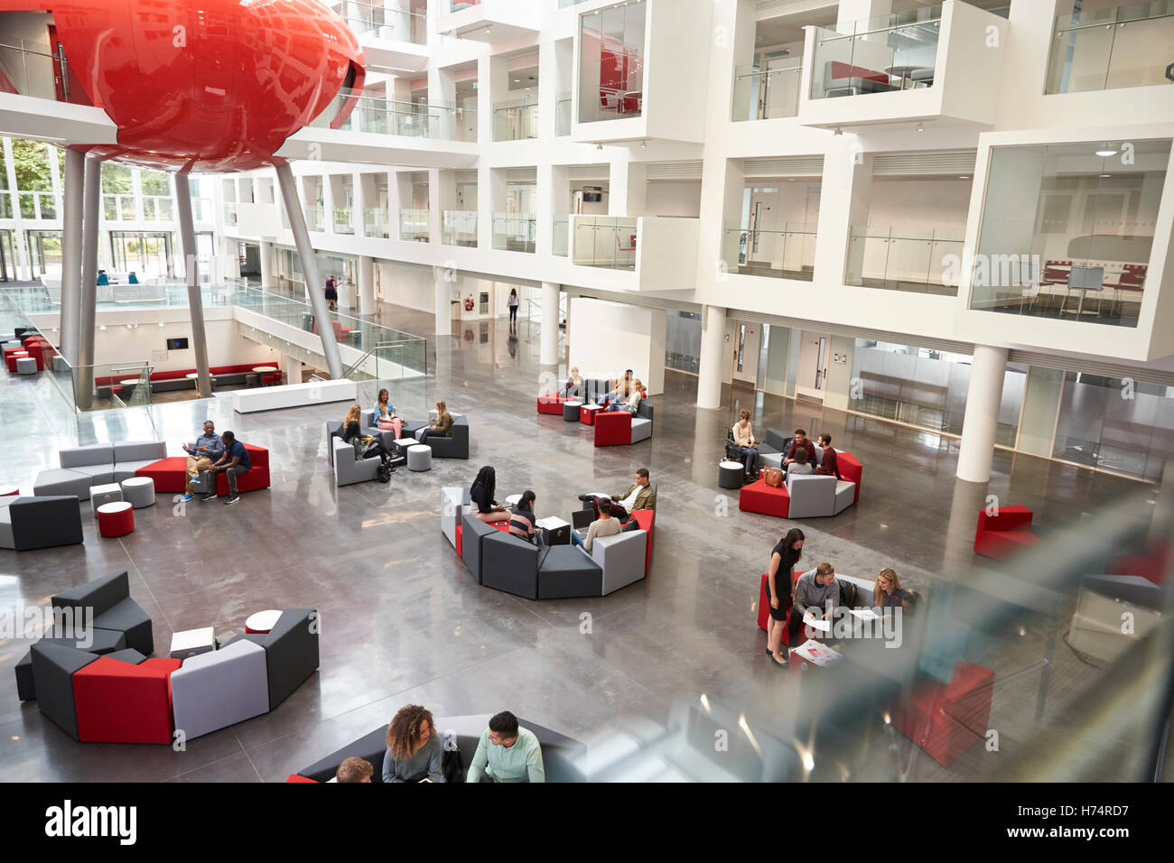 Students in a modern university atrium, view from mezzanine Stock Photo ...