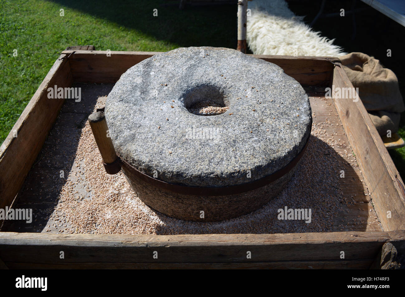 historical ancient millstone tool in medieval fair Stock Photo - Alamy