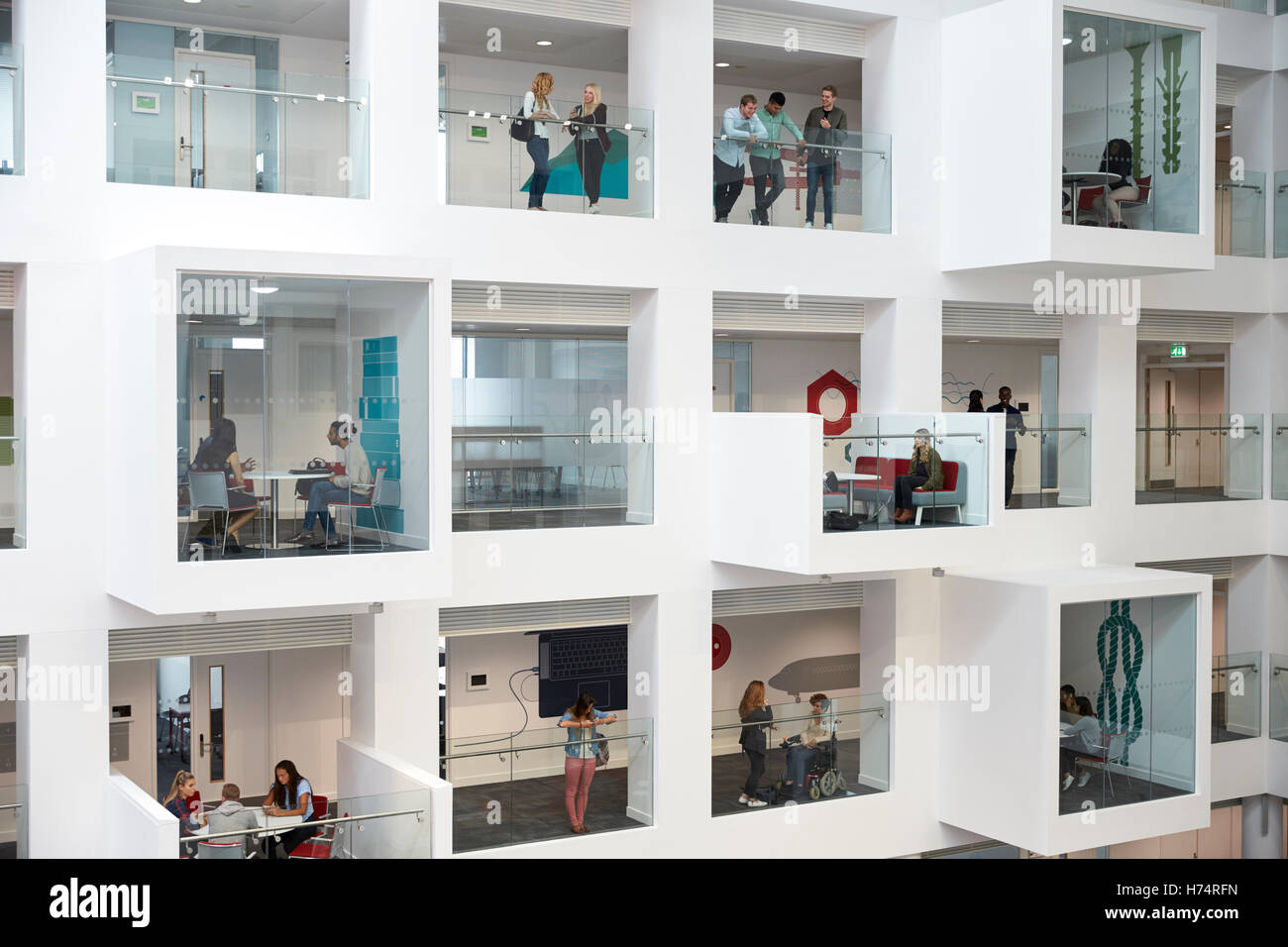 University atrium, rooms and balconies, seen from mezzanine Stock Photo ...