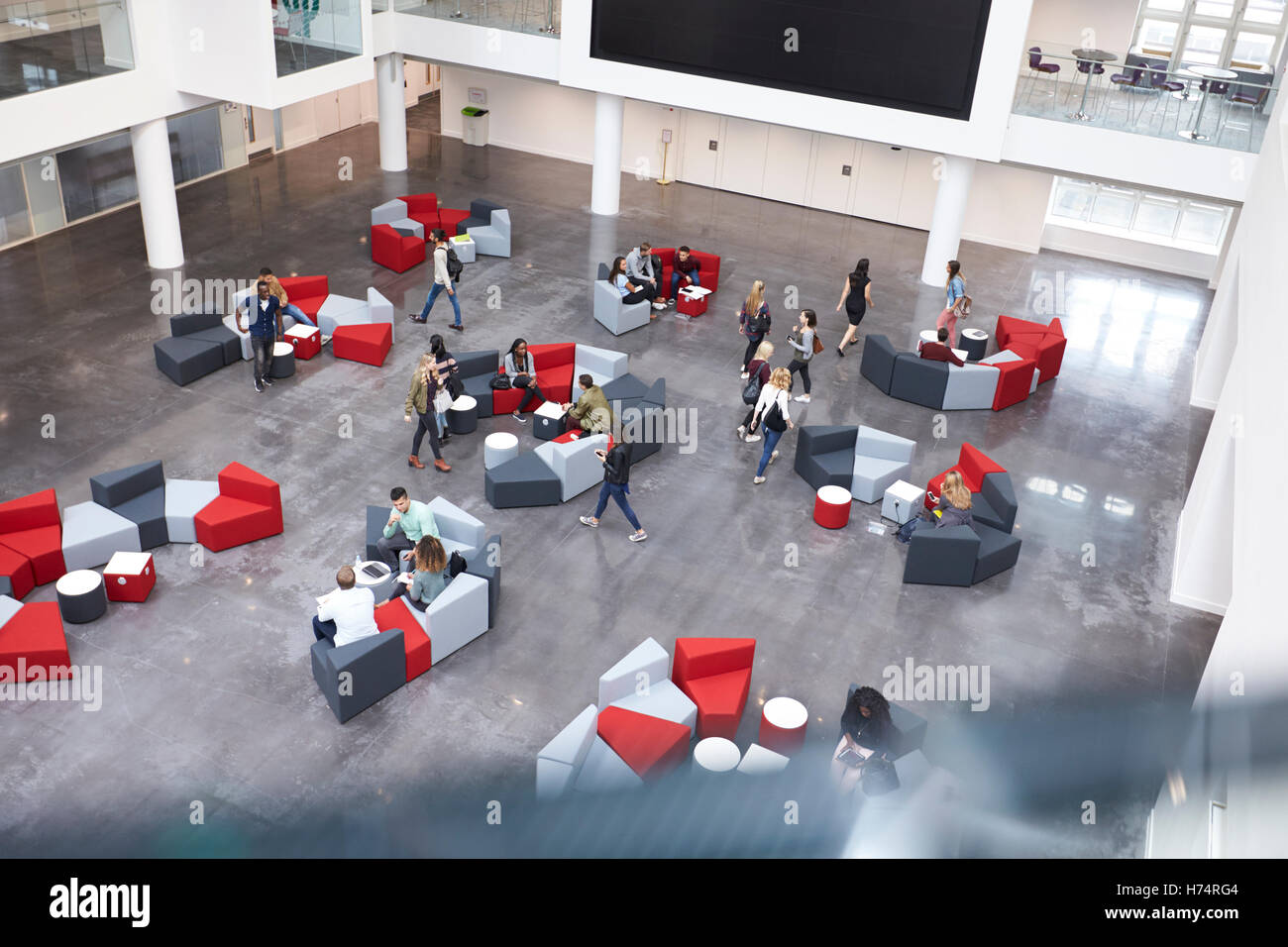 Busy university atrium area, seen from an indoor balcony Stock Photo ...