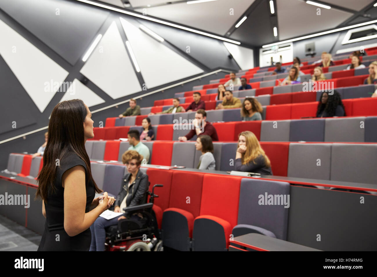 Back view woman in lecture hi-res stock photography and images - Alamy