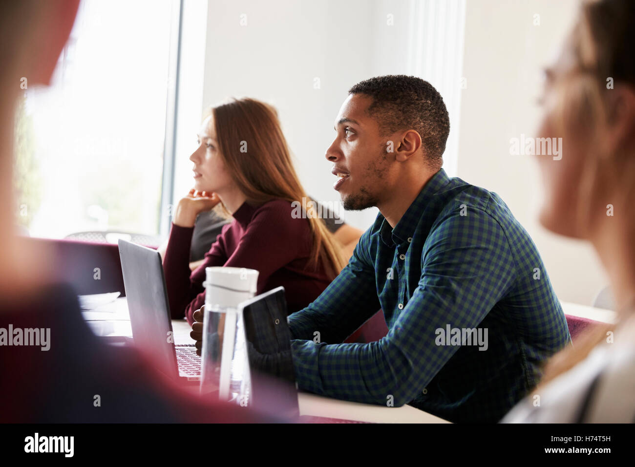 College students lecture side view hi-res stock photography and images ...