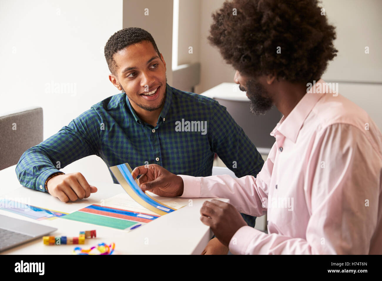 Tutor Using Learning Aids To Help Student With Dyslexia Stock Photo - Alamy