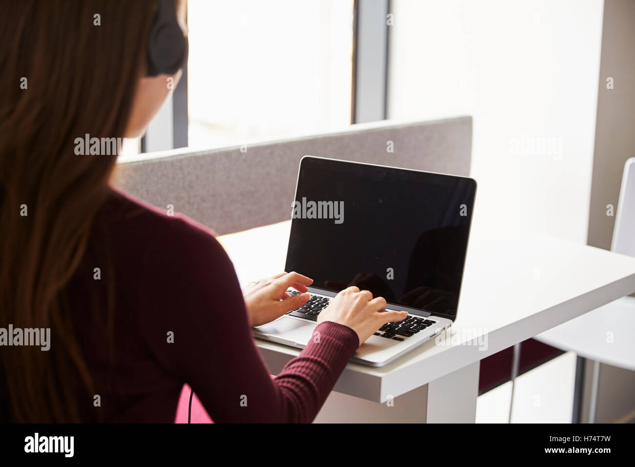 View Over The Shoulder Of Female Student Using Laptop Stock Photo - Alamy