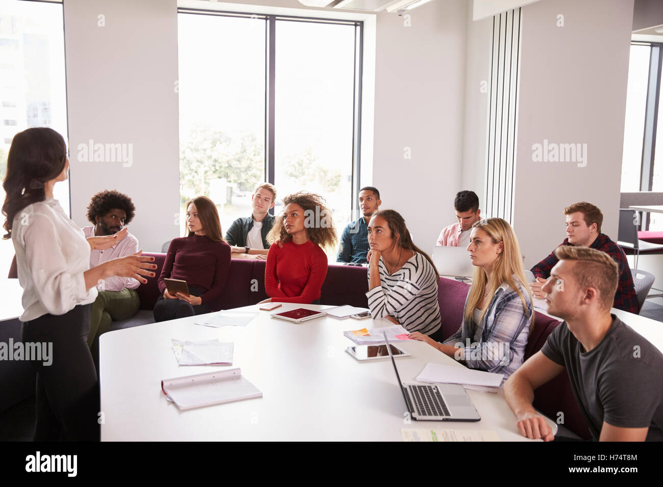 Group Of University Students Attending Lecture On Campus Stock Photo ...