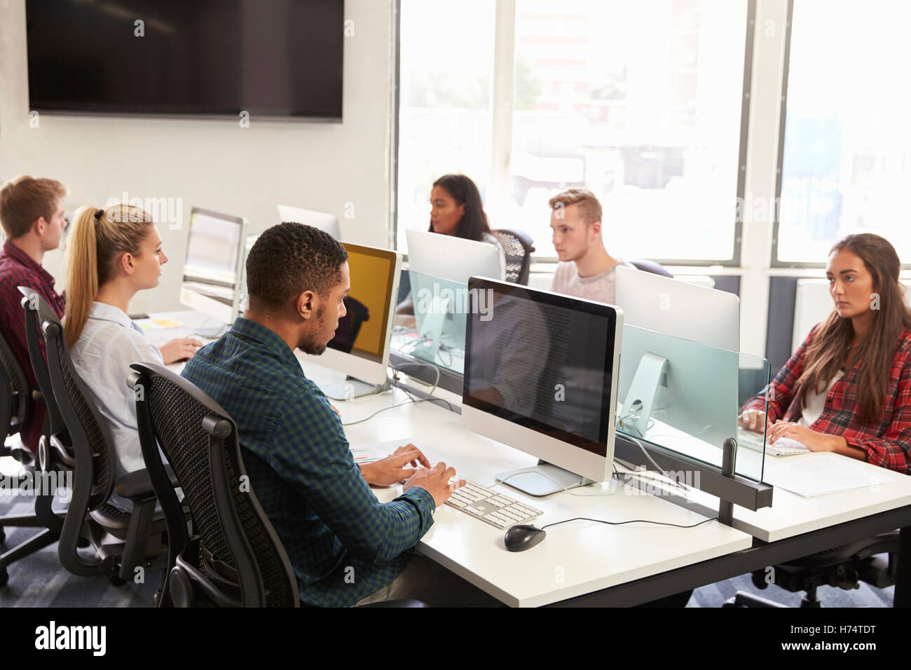 Group Of University Students Using Online Resources Stock Photo - Alamy