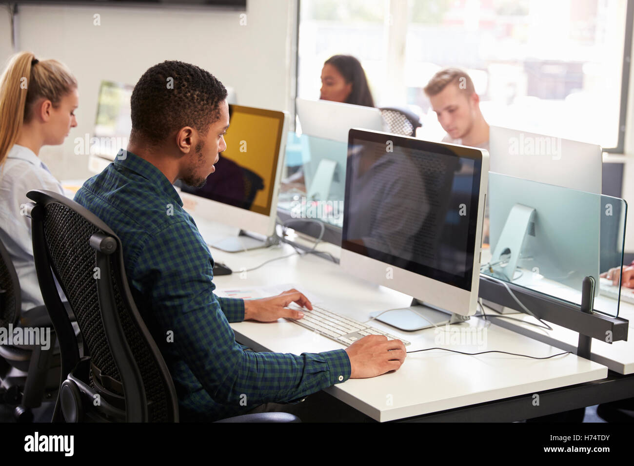 Group Of University Students Using Online Resources Stock Photo - Alamy