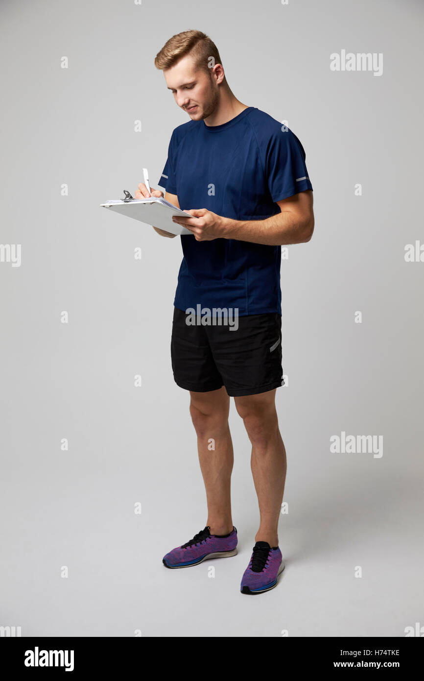 Sport male coach full length hi-res stock photography and images - Alamy