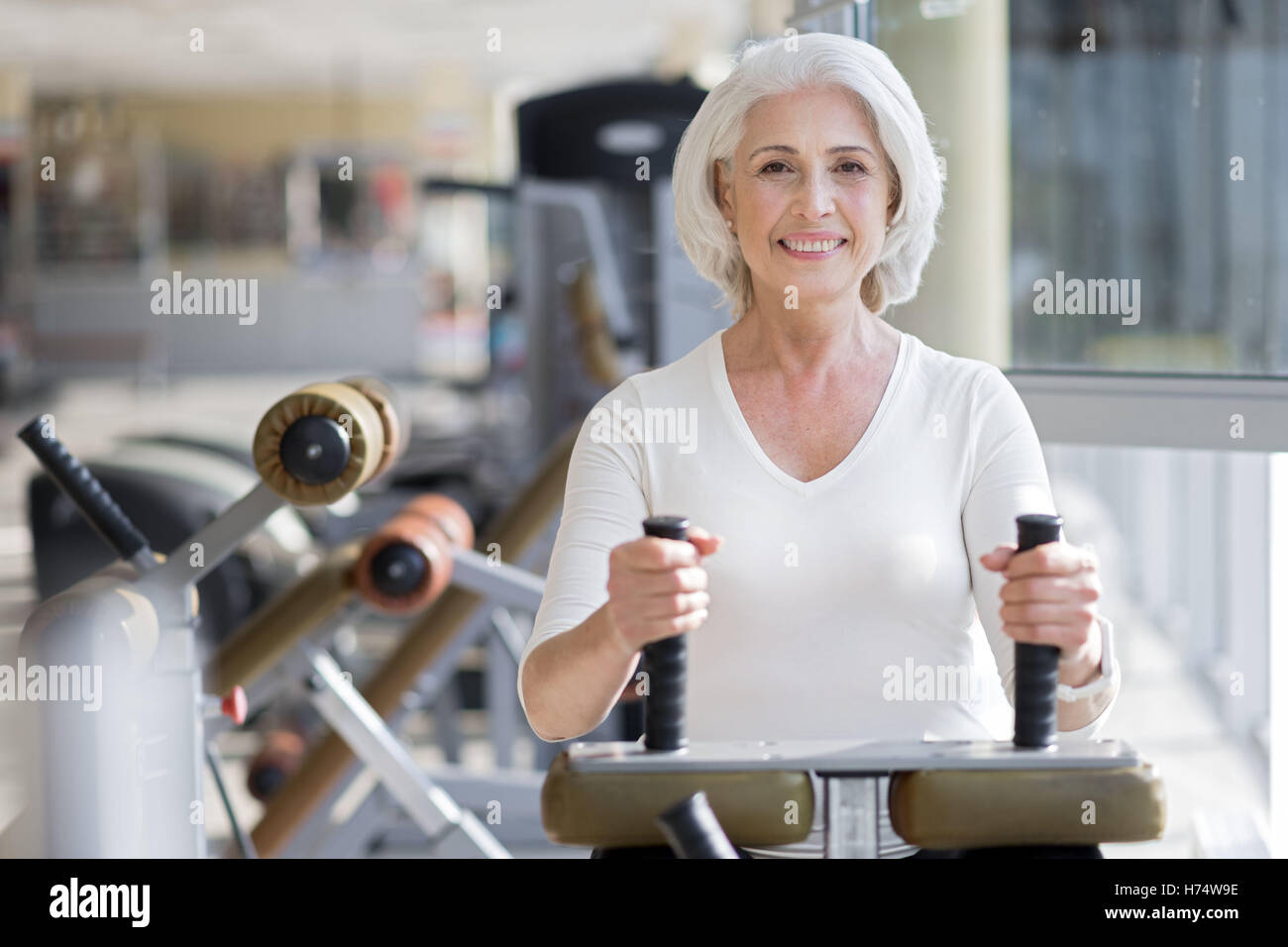 Attractive fit senior woman working out Stock Photo - Alamy