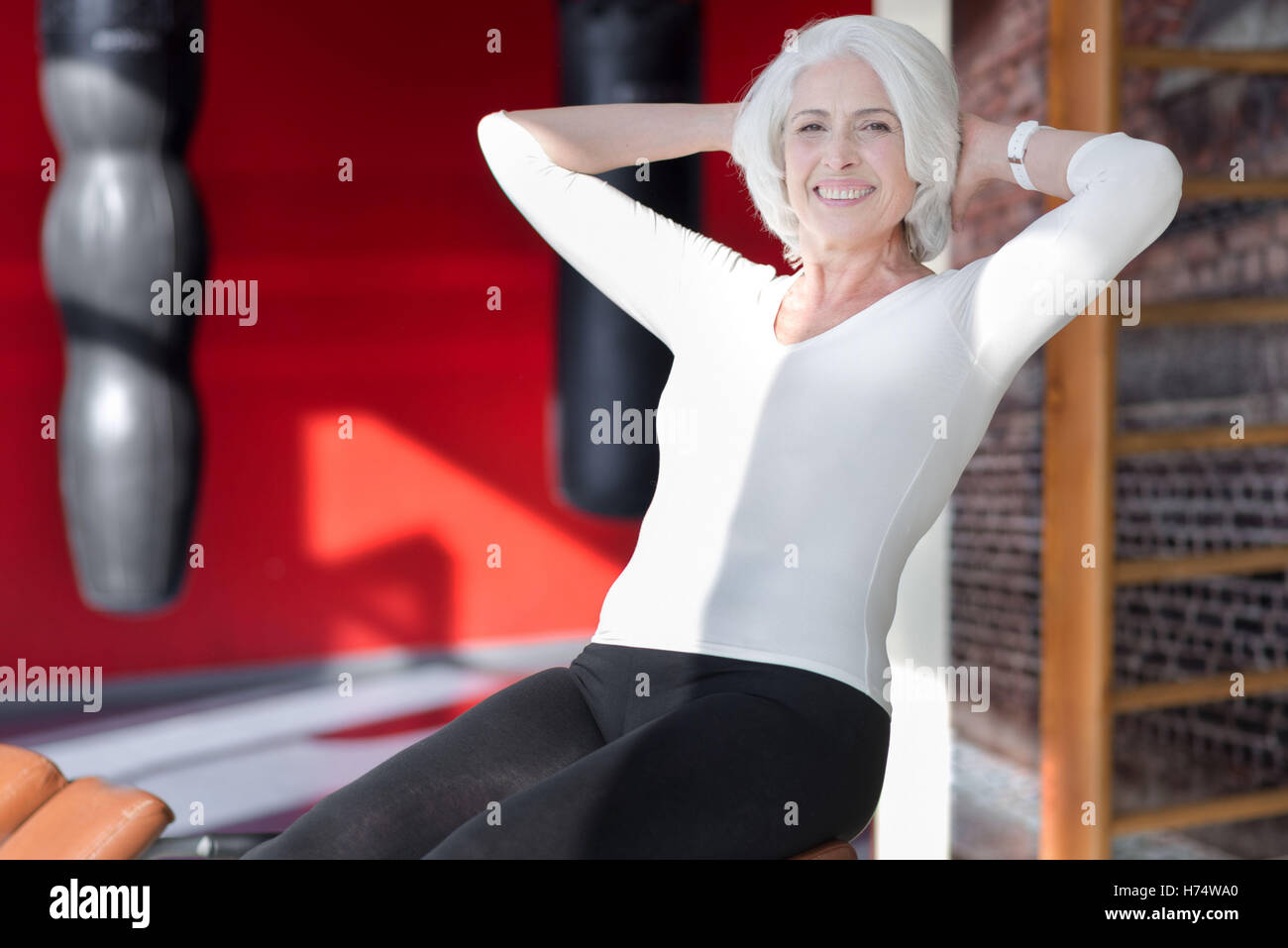 Charming fit senior woman working out Stock Photo - Alamy