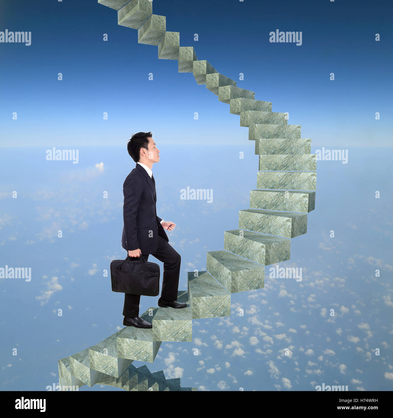 business man going upstairs in a curved staircase to success with blue ...
