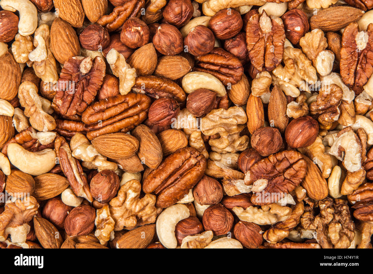 Mix of different nuts closeup photo Stock Photo - Alamy