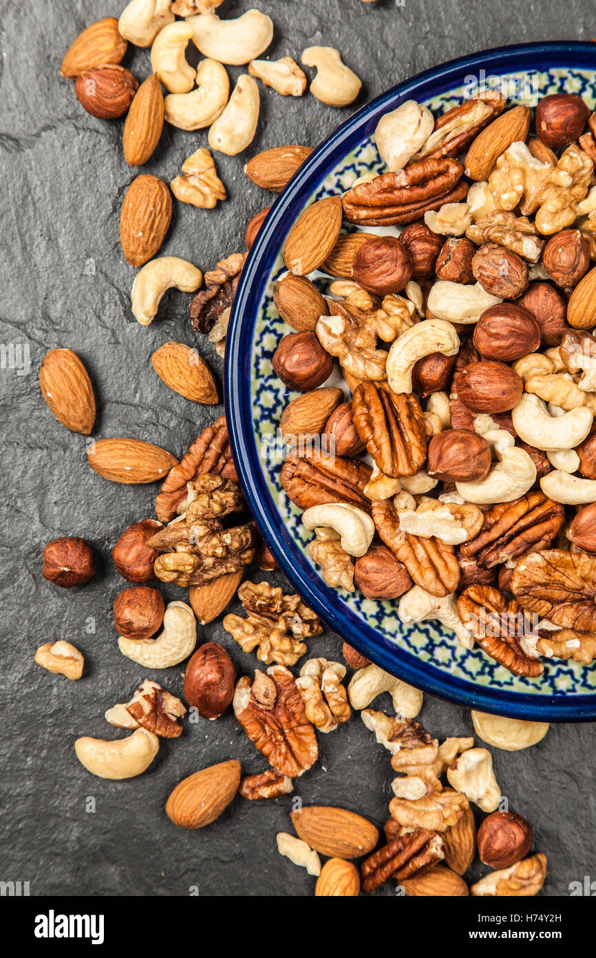 Mix of different nuts closeup photo Stock Photo - Alamy