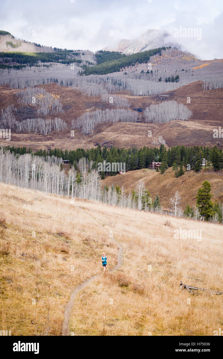 Running in the fall Stock Photo - Alamy