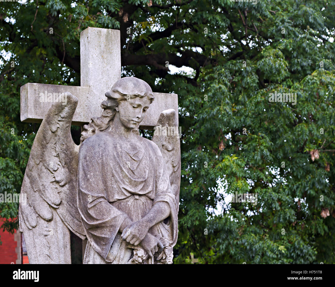 An old graveyard statue of an angel Stock Photo - Alamy